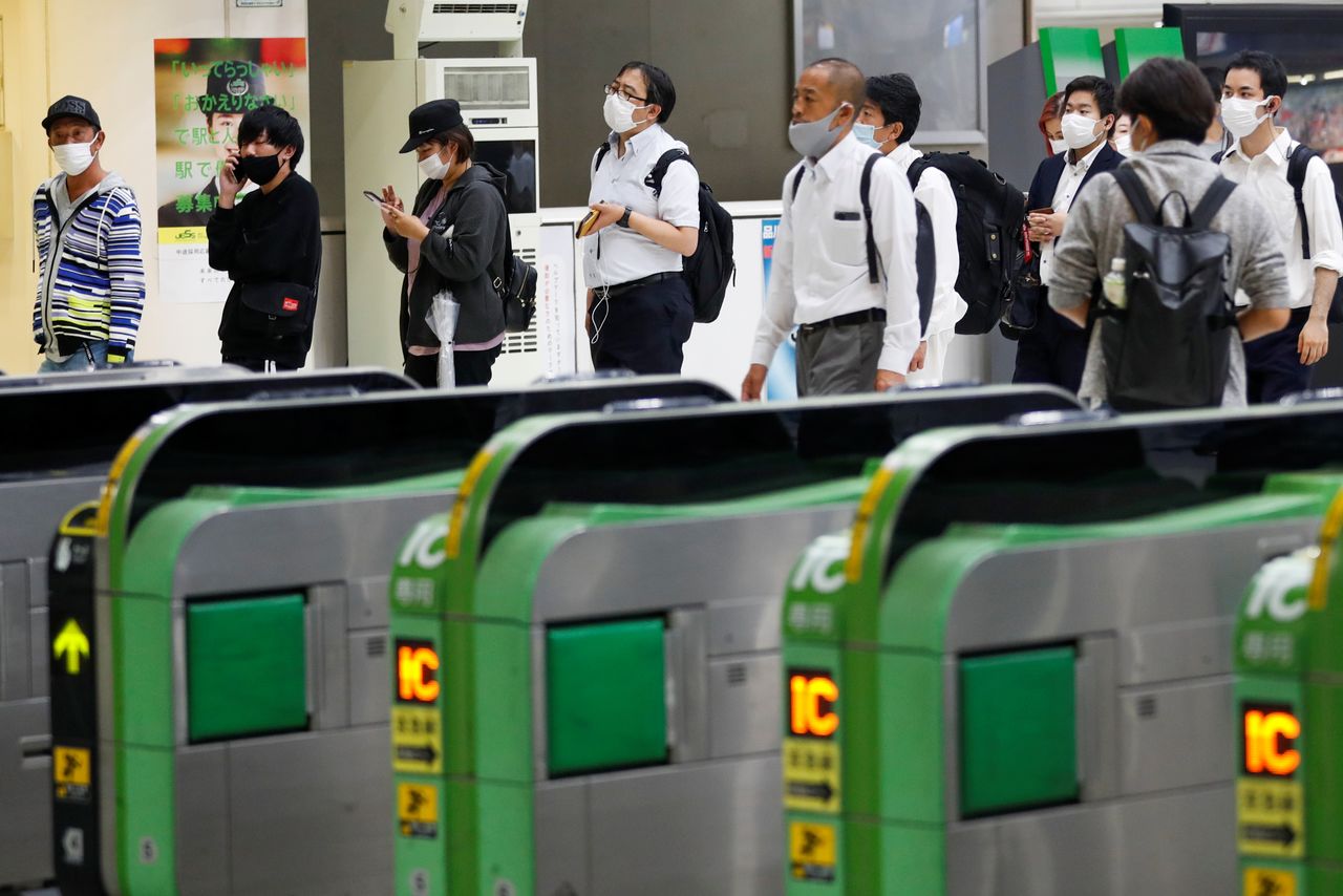 Tokyo trains crowded but little other damage day after strong quake ...